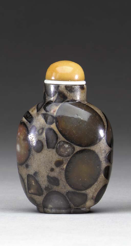 A QUARTZ CONGLOMERATE 'PUDDINGSTONE' BOTTLE