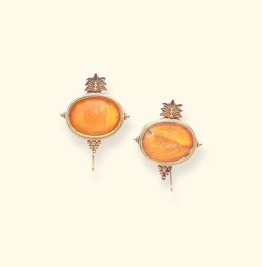 A PAIR OF ANTIQUE CARNELIAN AND GOLD EAR PENDANTS | Christie's