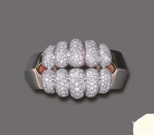 AN ELEGANT ART DECO BANGLE BRACELET, BY SUZANNE BELPERRON | Christie's
