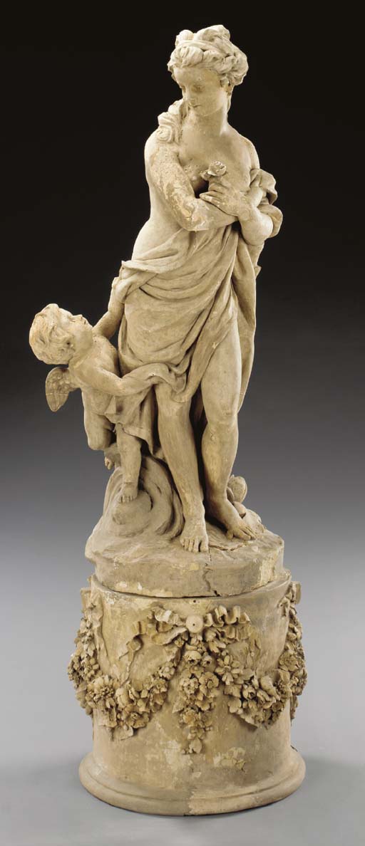 A PAINTED AND TINTED-PLASTER GROUP OF VENUS AND CUPID