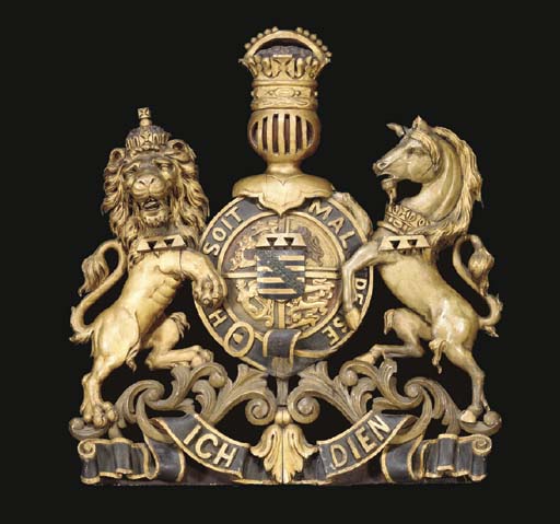 AN ENGLISH GILTWOOD AND POLYCHROME-DECORATED ROYAL COAT-OF-ARMS OF ...