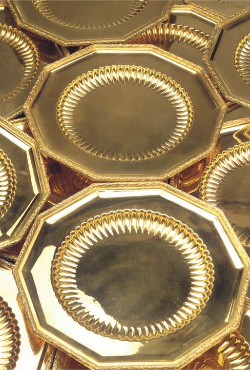 Twelve Austrian silver-gilt plates
