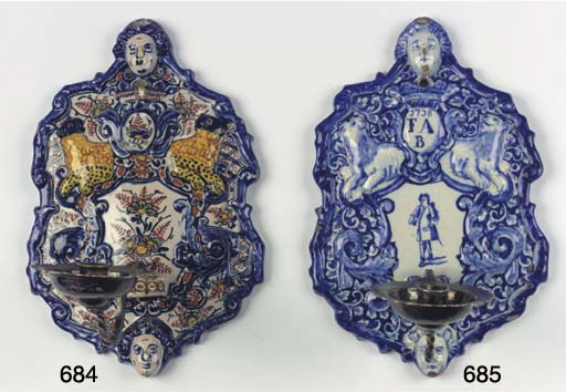 (2) A Dutch Delft polychrome shaped wall sconce with silver candlestick ...