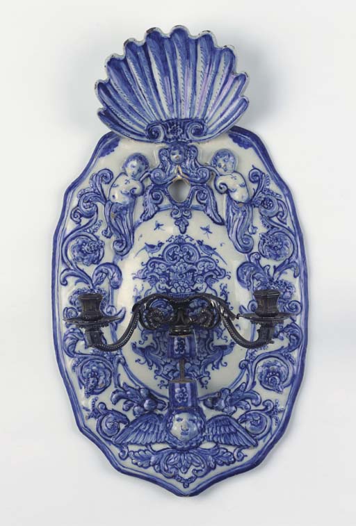 (2) A Dutch Delft polychrome shaped wall sconce with silver candlestick ...