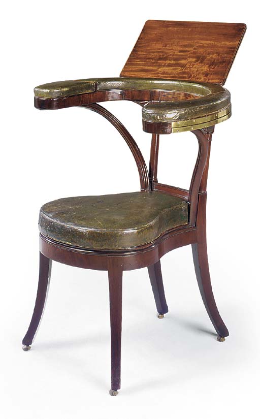 A REGENCY MAHOGANY READING-CHAIR