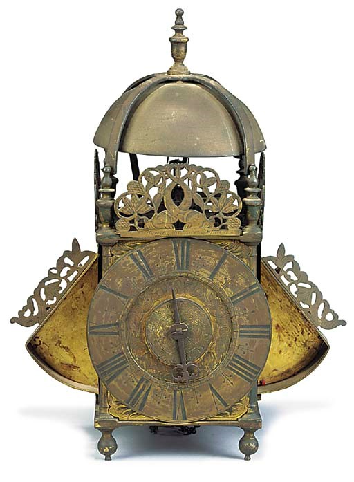 An English brass striking lantern clock with alarm, third quarter 17th ...
