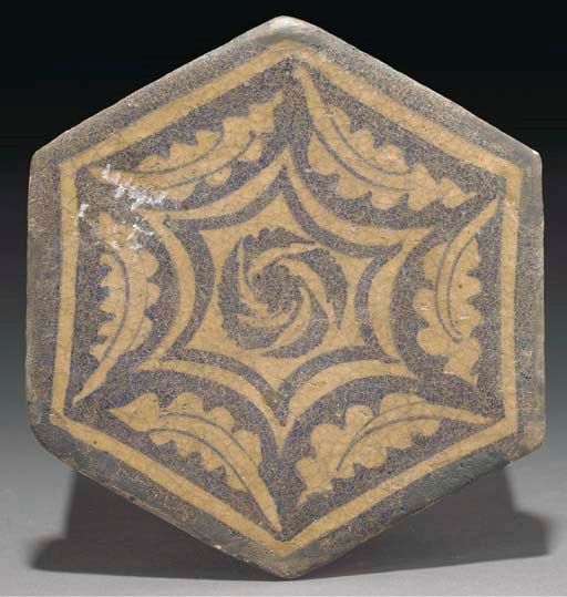 A Timurid blue, black and white pottery tile, greater Iran, 15th century