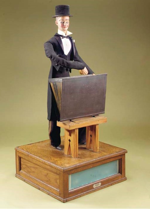 A rare advertising automaton of a magician, | Christie's