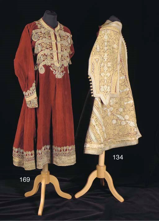 A wedding robe of crimson plush, with full skirt and long sleeves ...