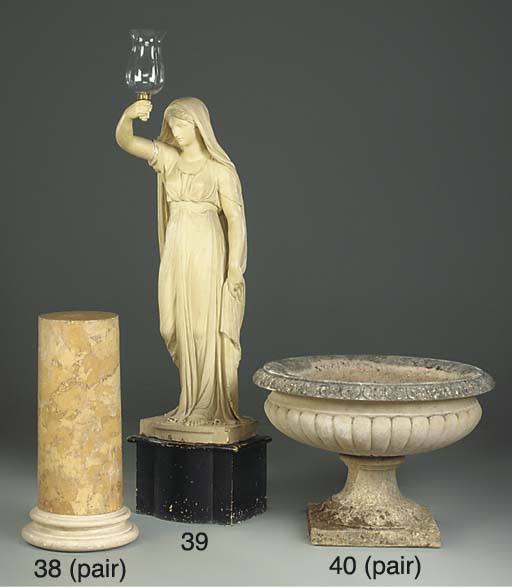 A late George III painted plaster figural torchere