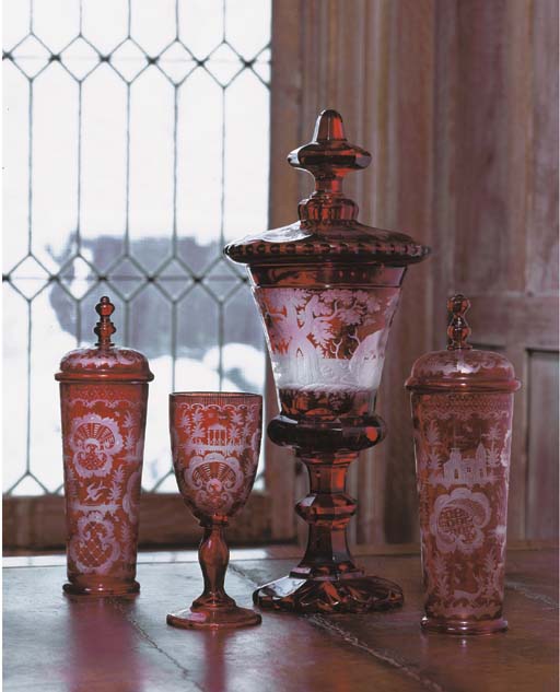 A BOHEMIAN RUBY FLASH GLASS GOBLET AND COVER, A RUBY STAINED WINE GLASS ...