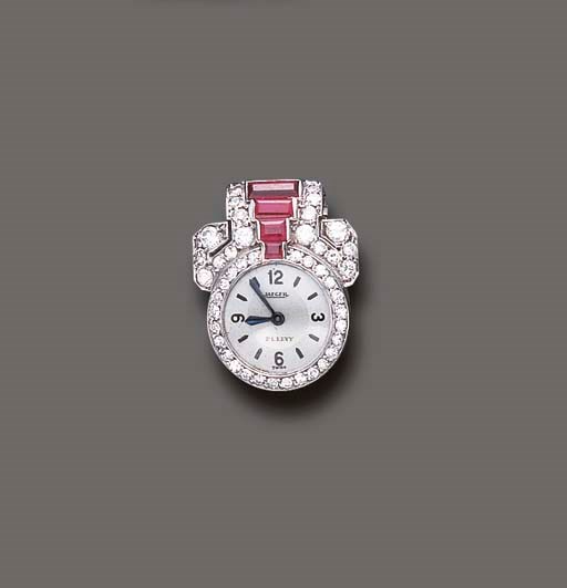 AN ART DECO RUBY AND DIAMOND LAPEL WATCH, BY JAEGER | Christie's