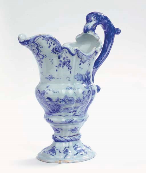 A Dutch Delft blue and white pastoral helmet ewer , 1750-1760 | Christie's