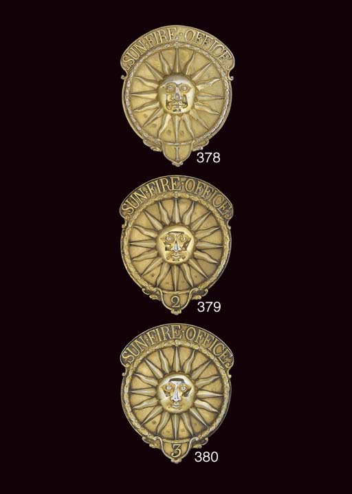 A GEORGE III SILVER-GILT SUN FIRE OFFICE FIREMAN'S ARM BADGE NUMBER 2