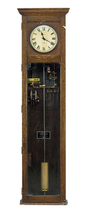 Magneta. An English oak battery/mains power supply electrically reset ...