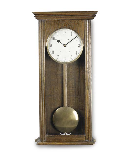 Electric Self-Winding Clock. An English oak electrically rewound wall ...
