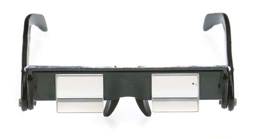 A pair of adjustable recumbent prism spectacles, | Christie's