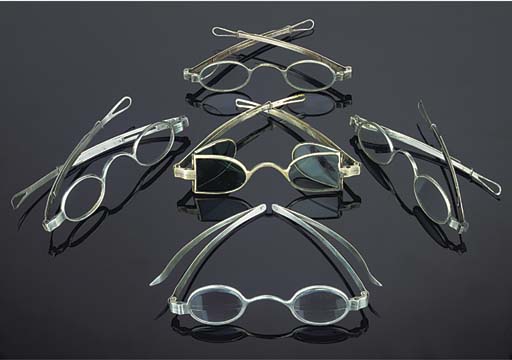 A pair of 19th-Century Benjamin Franklin-type bifocal spectacles,