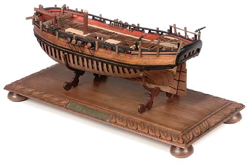 A PARTIALLY-PLANKED 3/8":1' SCALE UN-RIGGED MODEL OF THE 10-GUN CUTTER ...