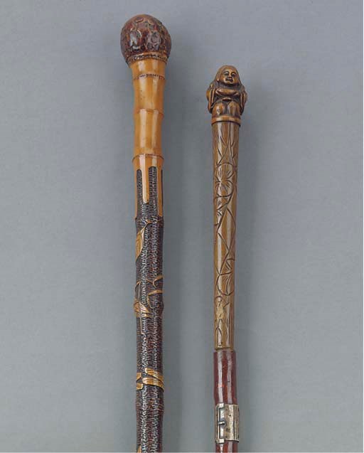 A group of five Japanese bamboo and soft wood walking canes