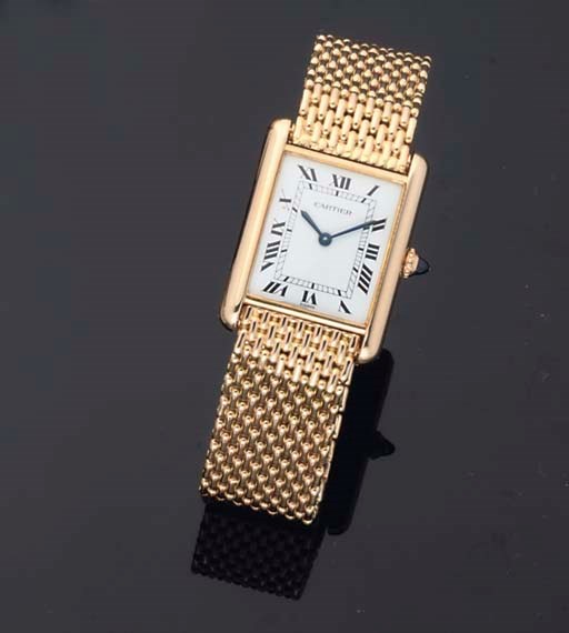 Cartier. An 18ct Gold Rectangular Cased Wristwatch on matching Bracelet ...