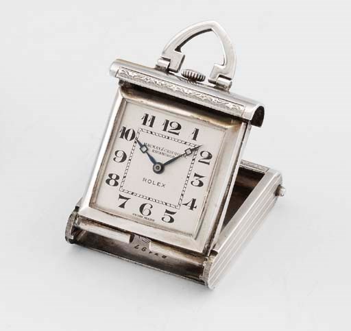 Rolex. An unusual silver purse watch , SIGNED ROLEX, RETAILED BY MACKAY ...