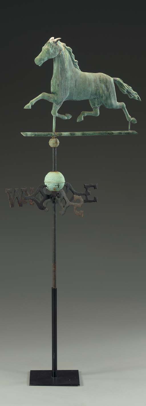 A MOLDED COPPER BLACK HAWK WEATHERVANE