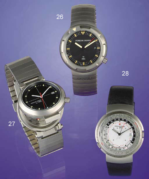 IWC. A TITANIUM CENTER SECONDS WORLD TIME WRISTWATCH WITH ALARM, DATE ...