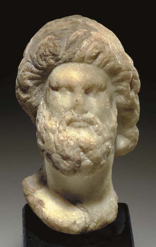 A ROMAN MARBLE HEAD OF JUPITER