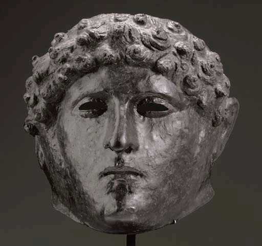 A ROMAN IRON MASK , CIRCA 1ST-2ND CENTURY A.D. | Christie's