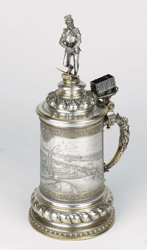 A large German silver and silver-gilt tankard , MARK OF P. BRUCKMANN ...