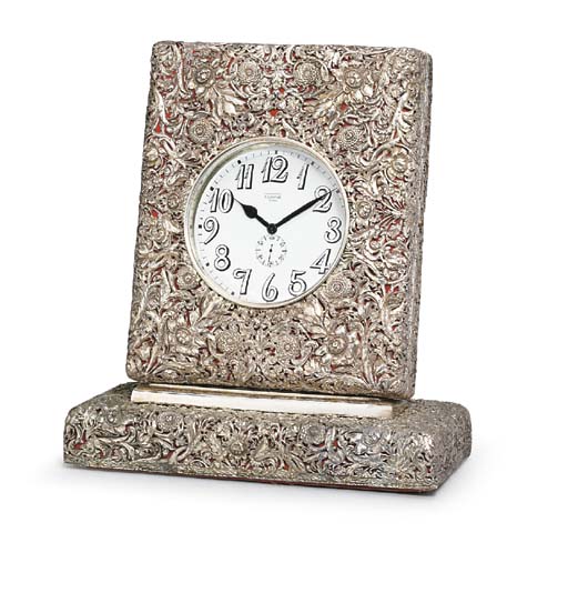 A rare Victorian gilt-brass and ebony timepiece in the form of a mortar ...