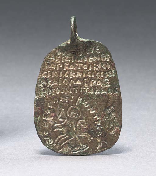 AN EARLY BYZANTINE BRONZE MAGICAL AMULET