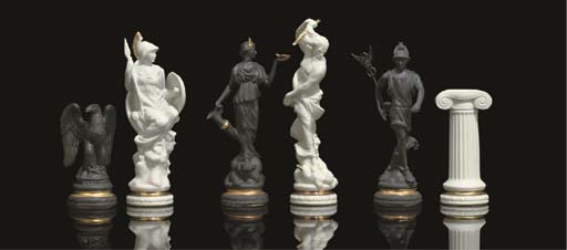 A PARCEL-GILT BISCUIT PORCELAIN FIGURAL CHESS SET