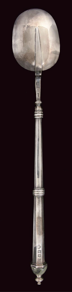 A MODERN IRISH SILVER CANNON-HANDLED HASH SPOON,