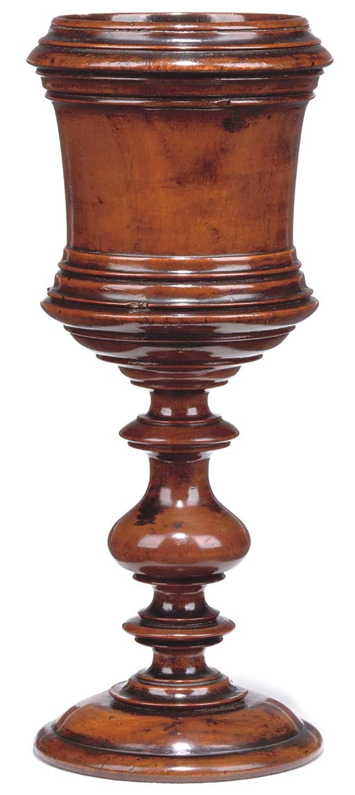 AN ENGLISH WALNUT STANDING CUP , CIRCA 1700 | Christie's