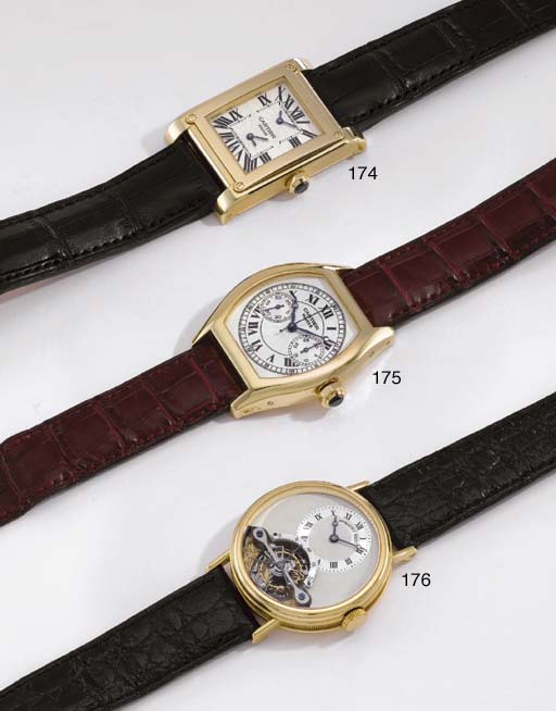 Cartier. A fine and large 18K gold rectangular two time zone wristwatch