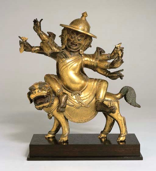 A gilt bronze figure of King Dharmapala Pehar , TIBETO-CHINESE, 18TH ...