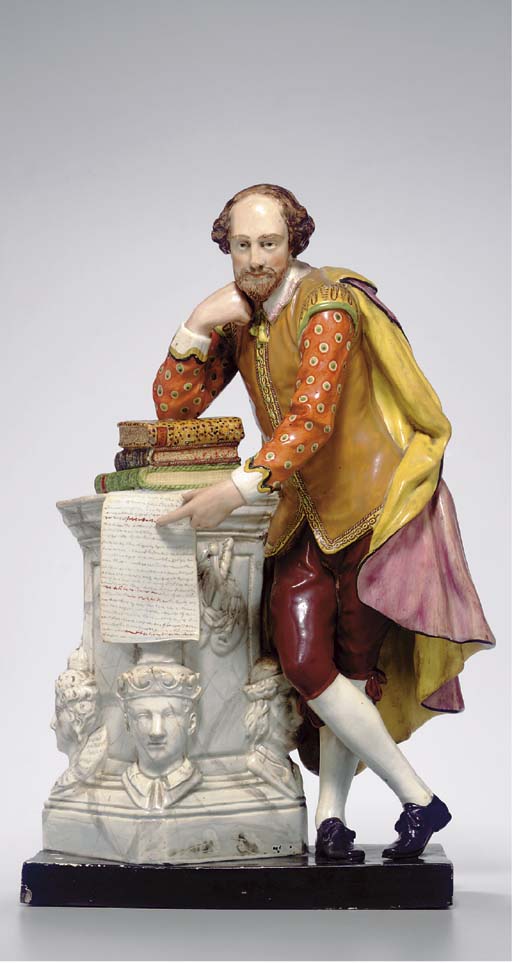 A STAFFORDSHIRE PEARLWARE FIGURE OF WILLIAM SHAKESPEARE