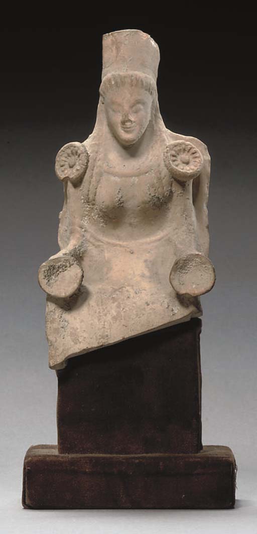 A SICILIAN TERRACOTTA FIGURE OF A GODDESS