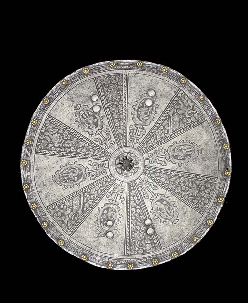 A GERMAN ETCHED CIRCULAR SHIELD