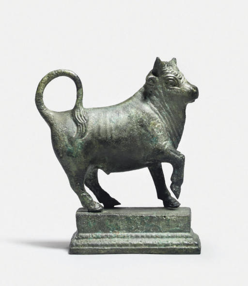 A ROMAN BRONZE FIGURE OF A BULL