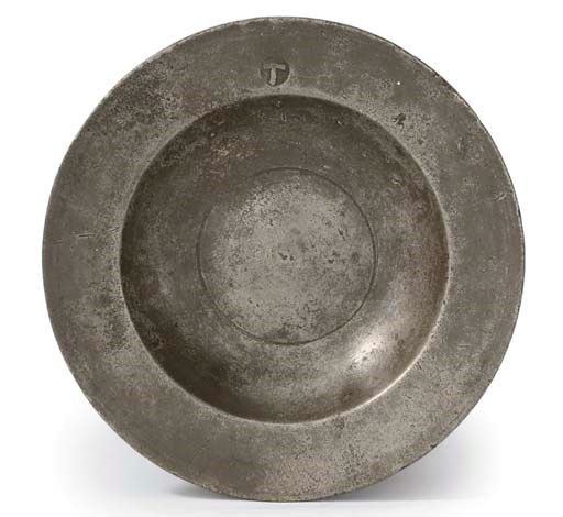 AN ENGLISH MEDIEVAL PEWTER SAUCER , CIRCA 1400 | Christie's