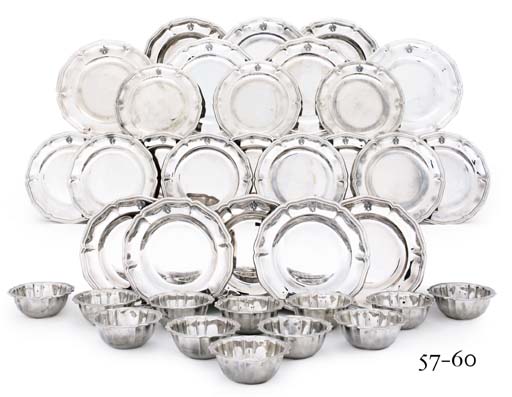 A SET OF TWELVE ITALIAN SILVER DINNER-PLATES