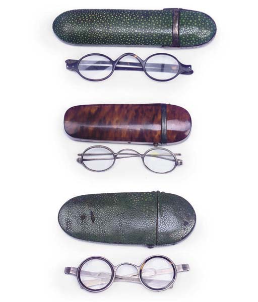 An unusual pair of Georgian silver spectacles with large round lenses ...