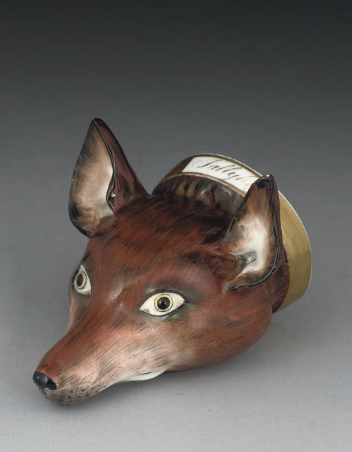 A STAFFORDSHIRE PORCELAIN FOX-HEAD STIRRUP-CUP