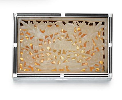 AN ART DECO JADEITE AND SILVER CASE | Christie's