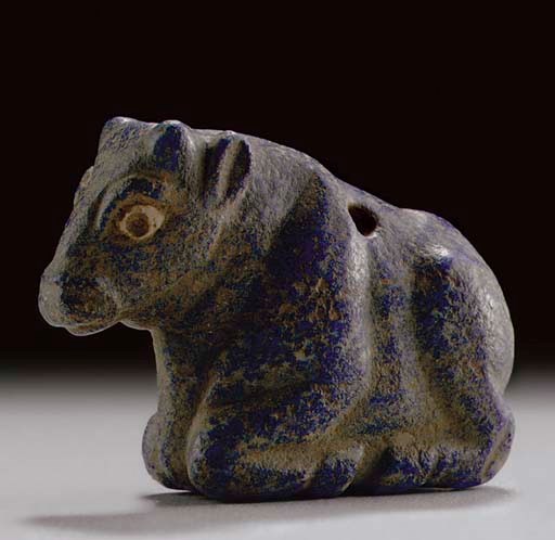 A MESOPOTAMIAN LAPIS LAZULI CALF AMULET , LATE URUK/JEMDET NASR, CIRCA ...