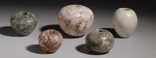 FIVE SYRIAN STONE MACE HEADS
