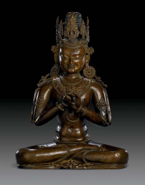 A large bronze figure of Vairocana